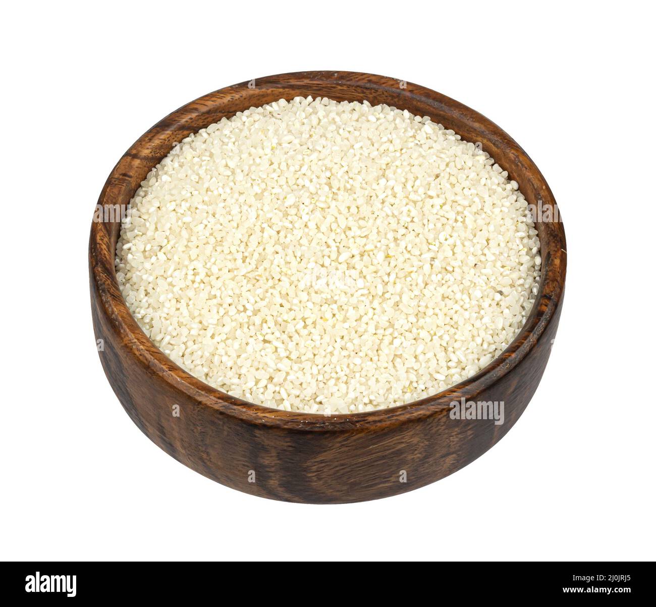 Small crushed rice isolated on white background Stock Photo - Alamy