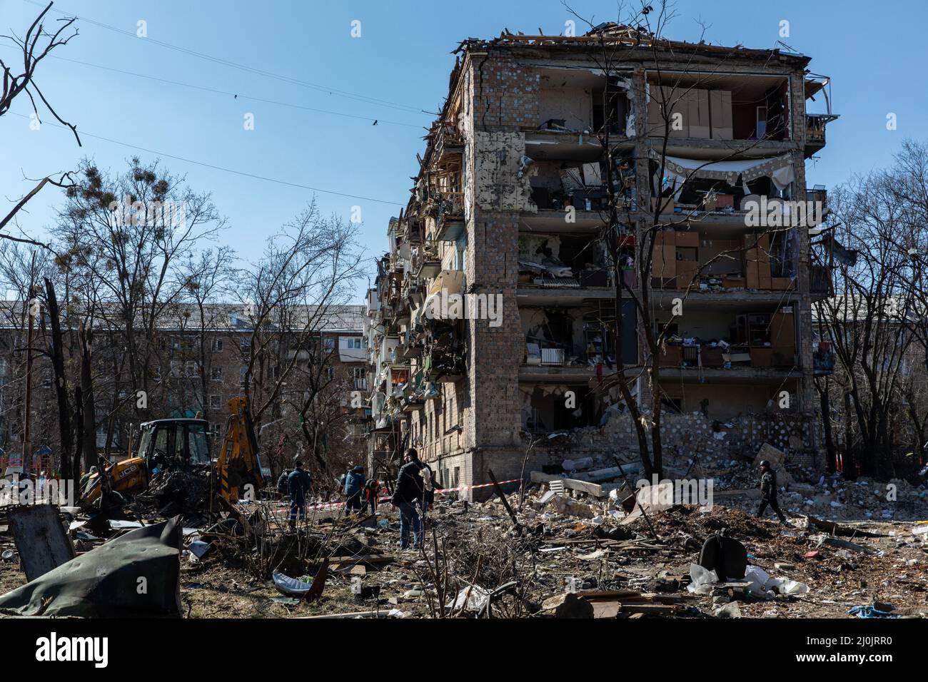 A site of a destroyed residential building by Russian missile strike ...