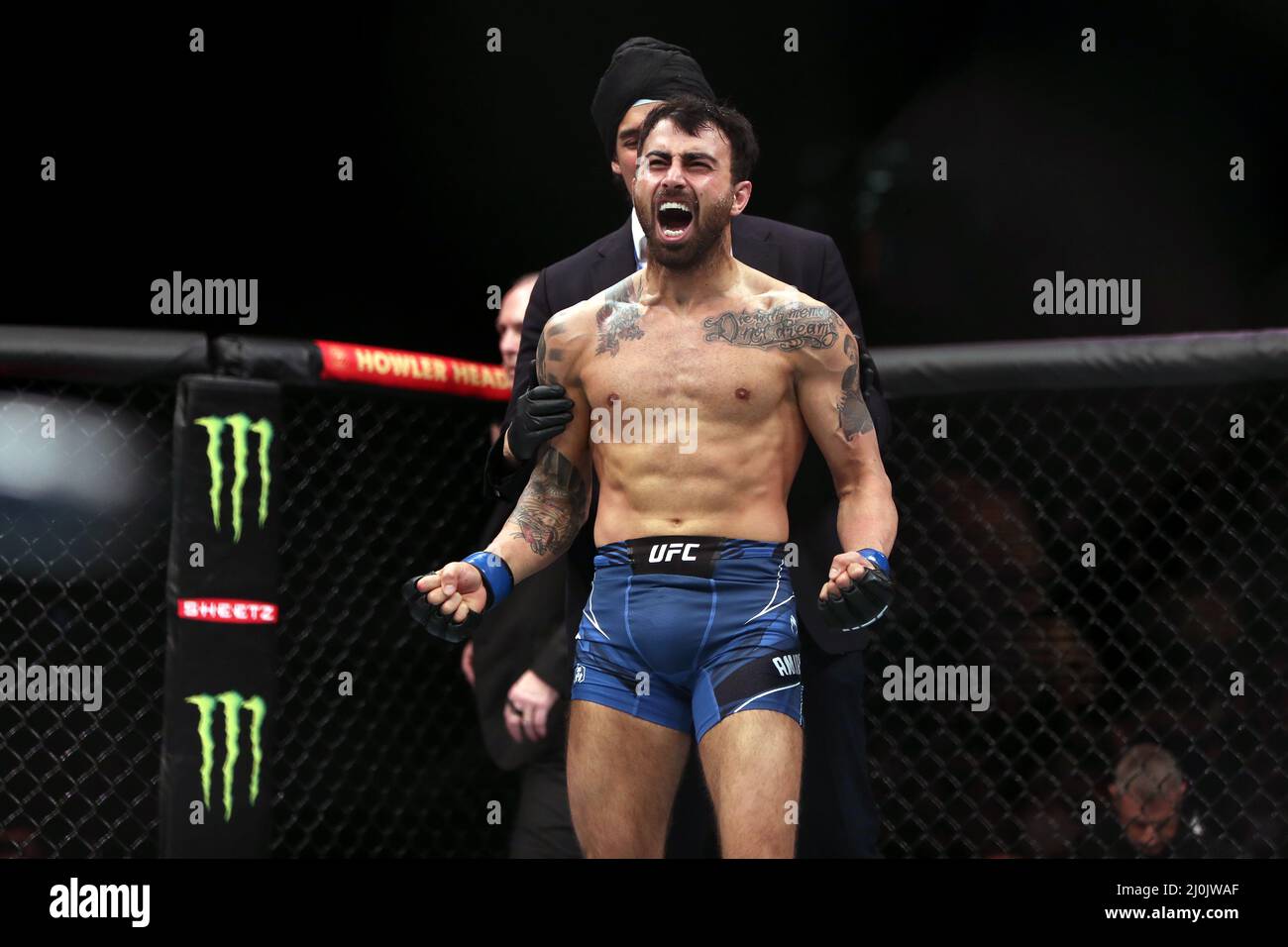 Makwan Amirkhani celebrates victory against Mike Grundy in the ...