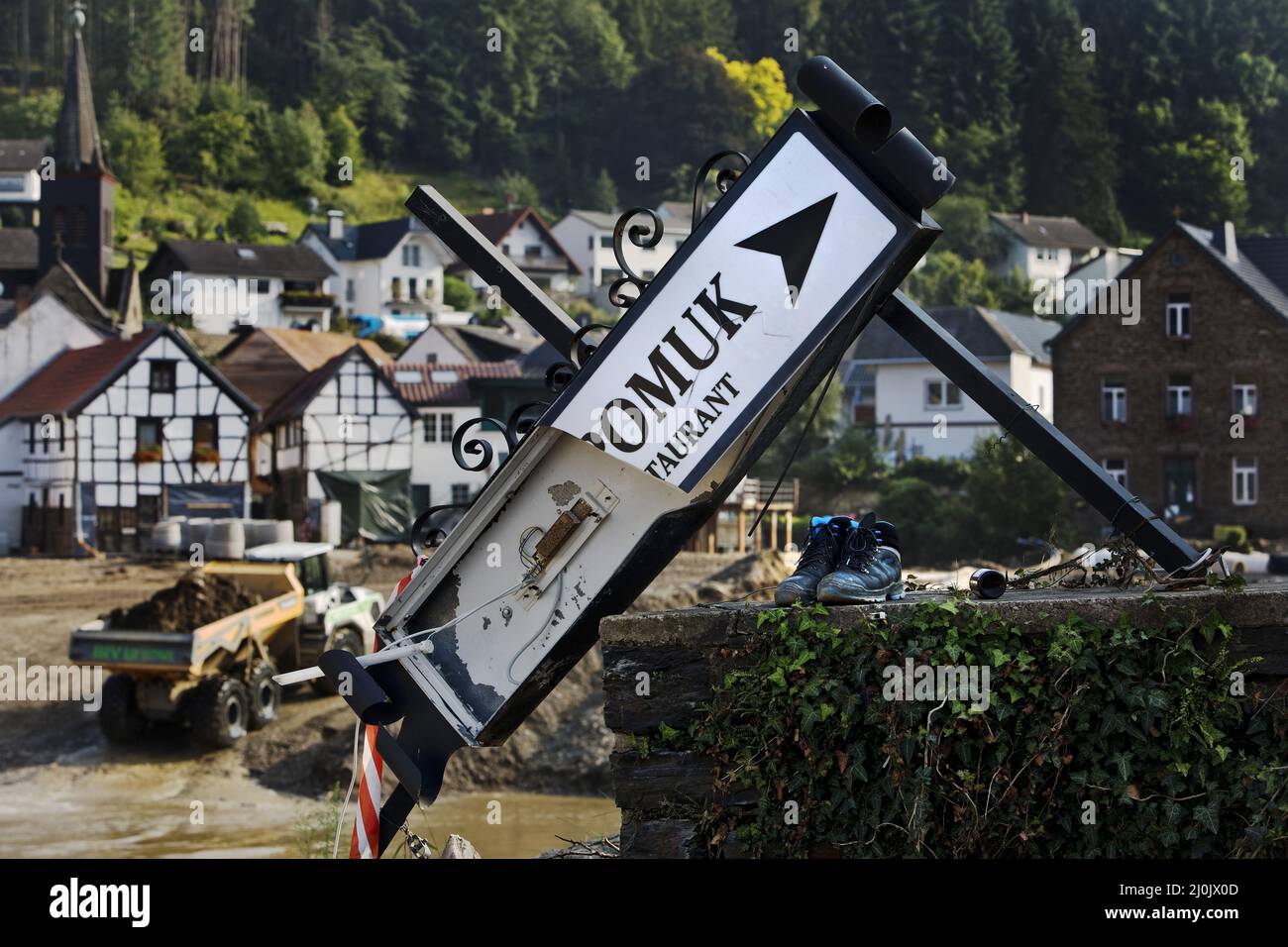 The destroyed sign St. Nepomuk winery and restaurant, flood disaster ...