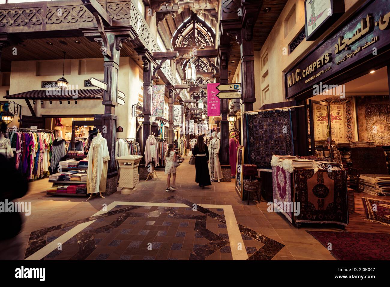Souvenir shop at Dubai Grand Souk. The traditional Arab style bazaar at Dubai Old Souq, United ...
