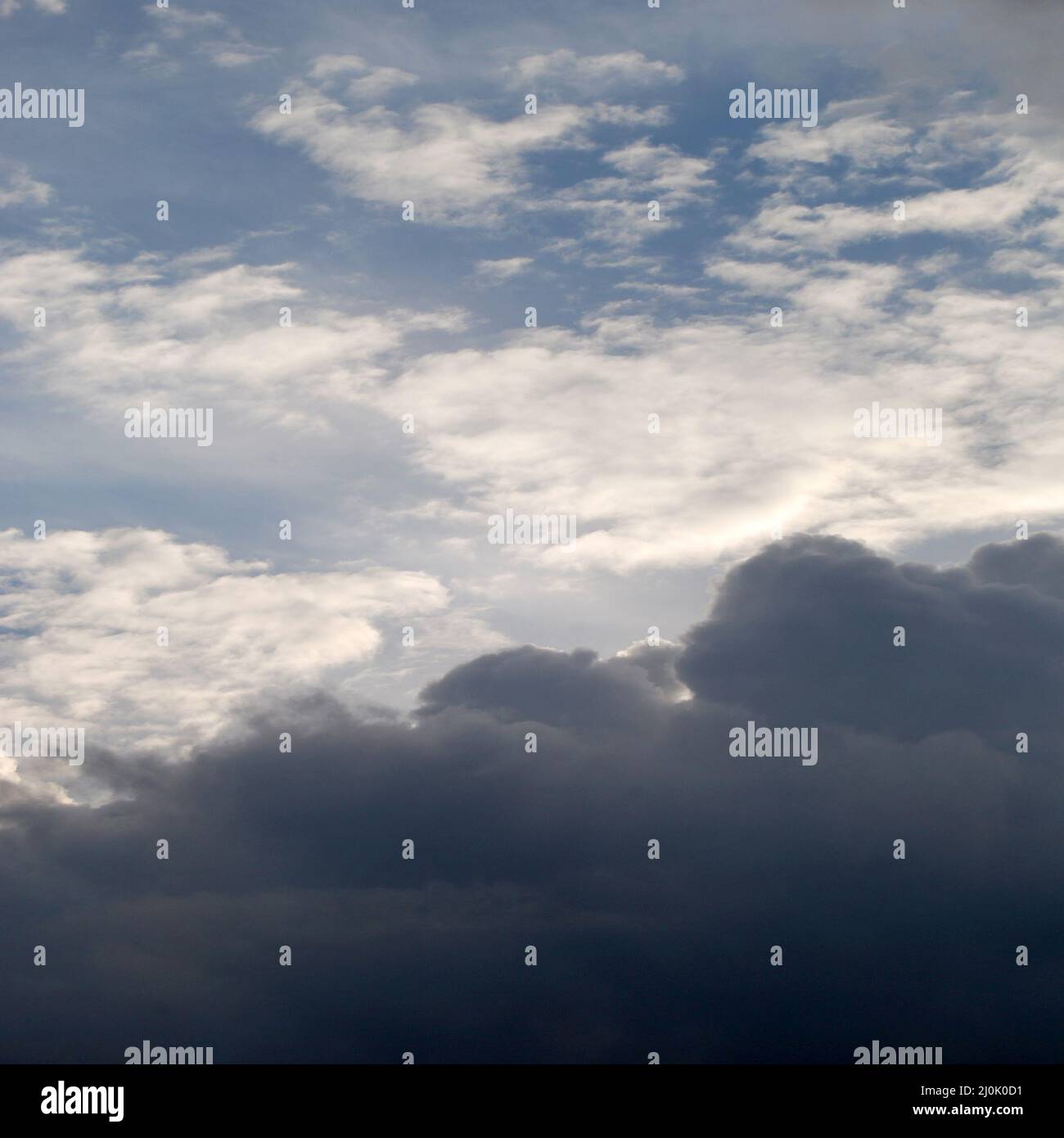 Rolling clouds before the storm and a slice of pure heaven Stock Photo ...