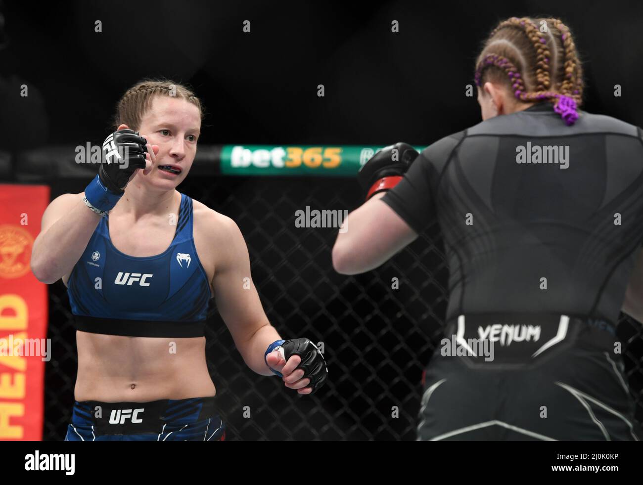 Cory McKenna seen in action with Elise Reed during the UFC Fight Night ...
