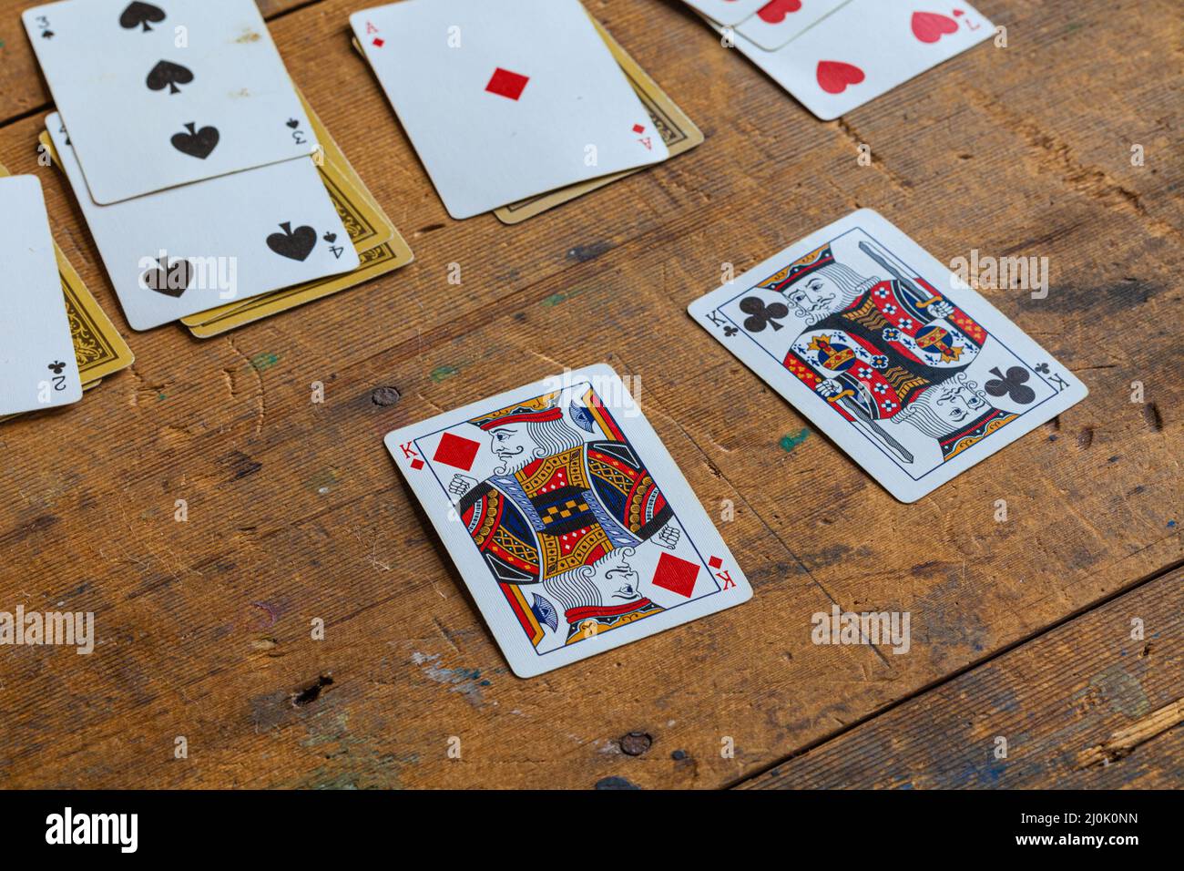Playing cards on a rustic pioneer table at the Britannia Ship Yard in ...