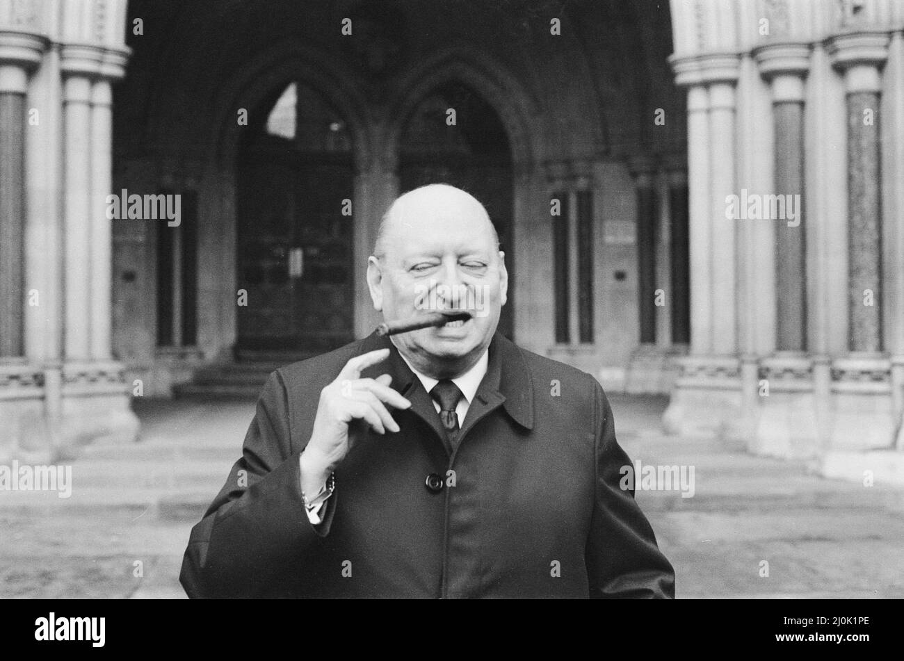 Media Mogul Lew Grade poses outside the High Court in London, smoking ...