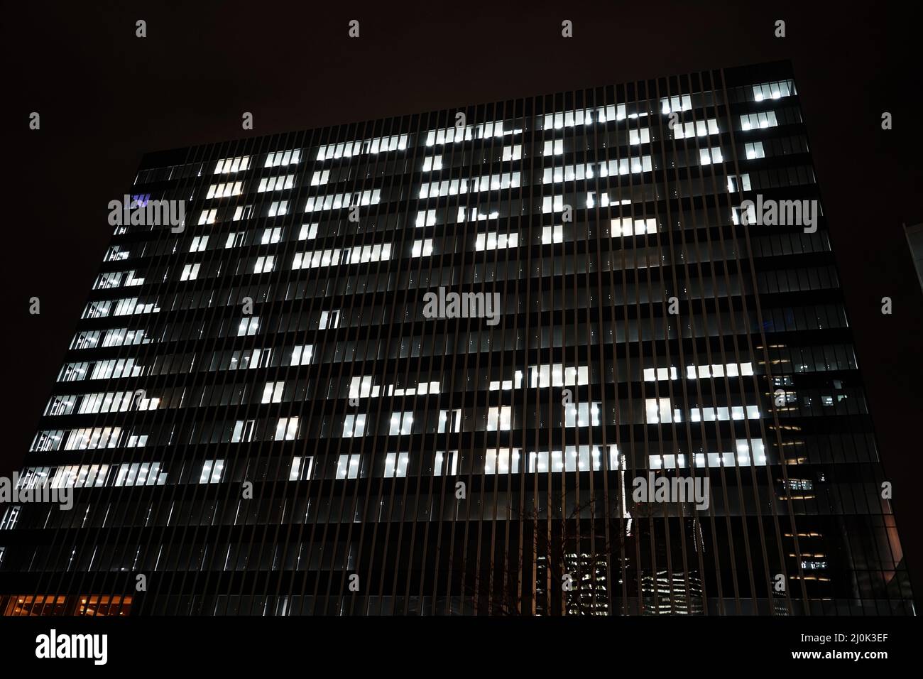 Christmas office buildings light up the Stock Photo - Alamy