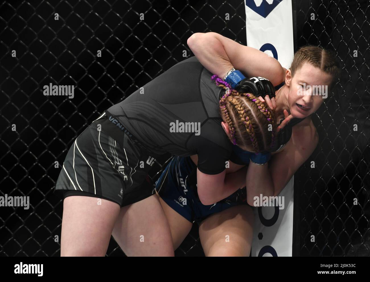 Cory McKenna seen in action with Elise Reed during the UFC Fight Night ...