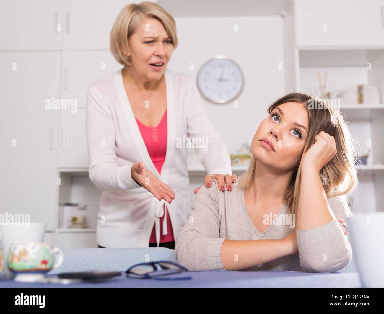 Mother scolds her adult daughter Stock Photo - Alamy