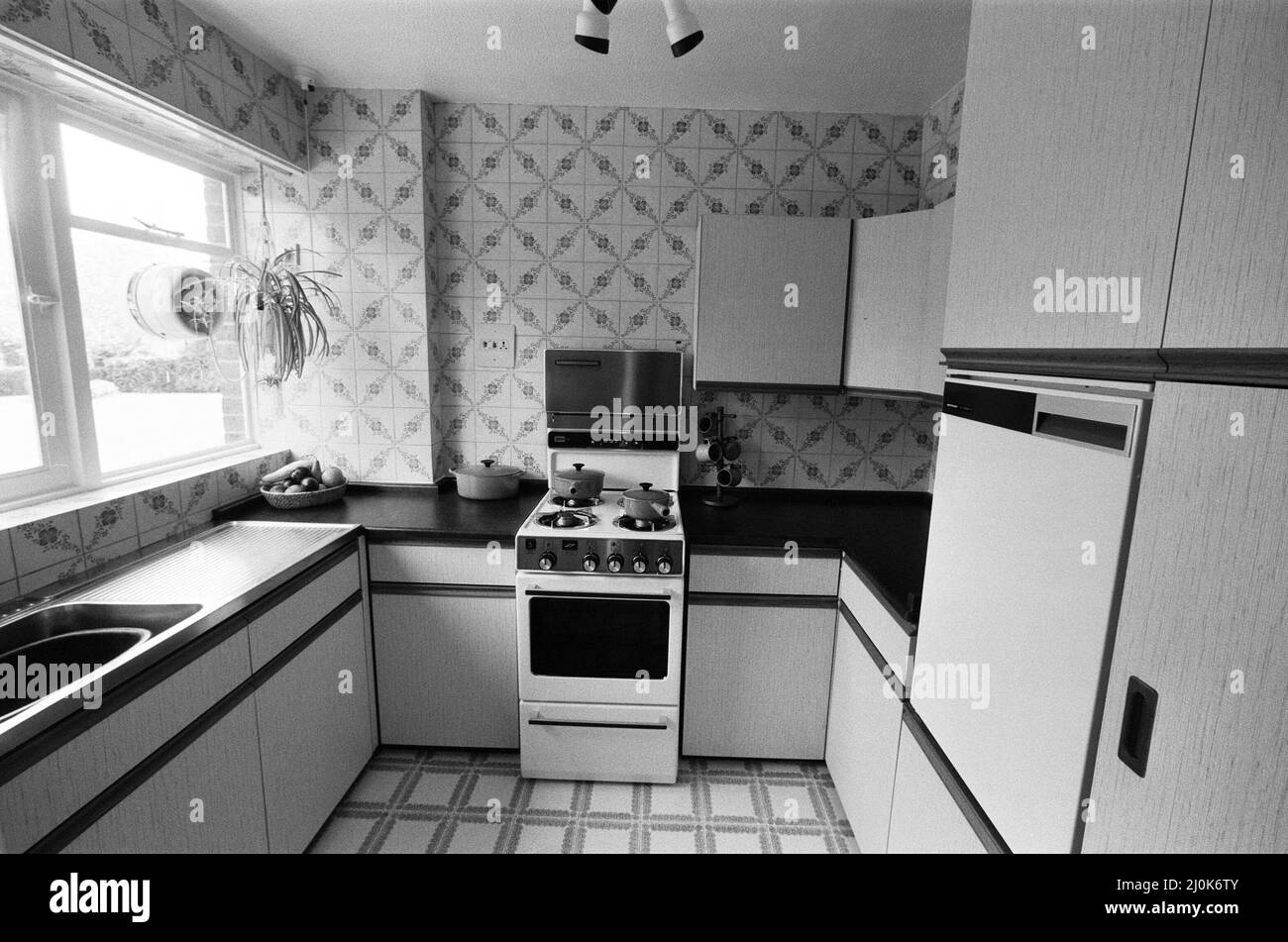Kitchen cooker and cupboards Black and White Stock Photos & Images - Alamy