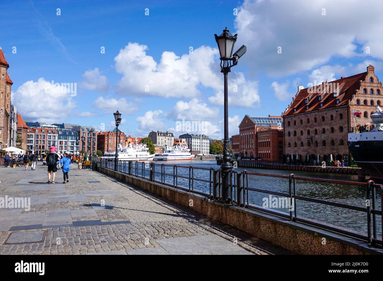 Tourists enjoy a visit to the historic city center of Danzig along the ...