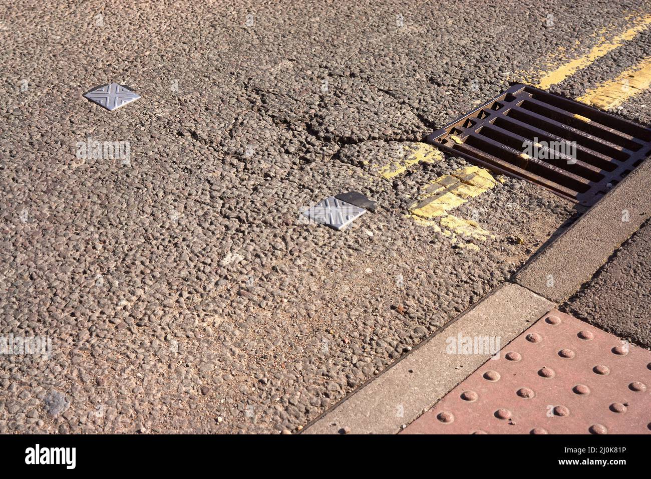 Cracked and worn road surface Stock Photo - Alamy