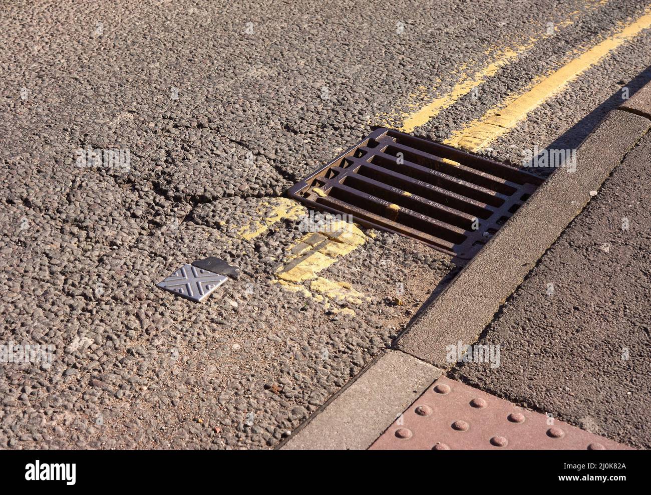 Cracked and worn road surface Stock Photo - Alamy