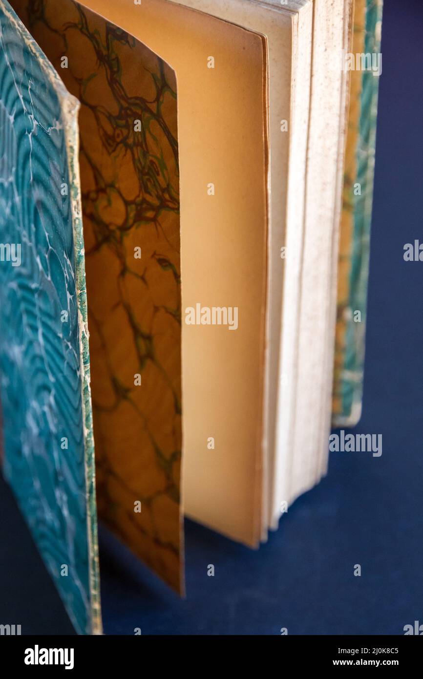Old book on black background Stock Photo - Alamy