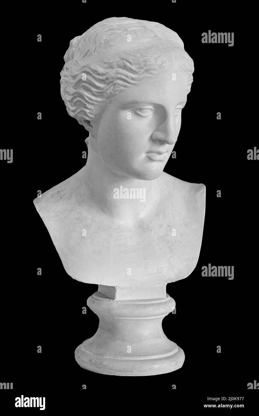 Gypsum copy of ancient statue Venus head isolated on black background ...