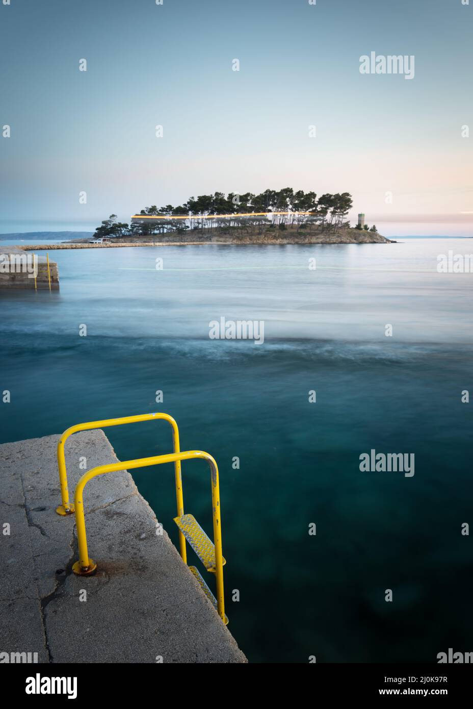 Pier and ladder on the beach Stock Photo - Alamy