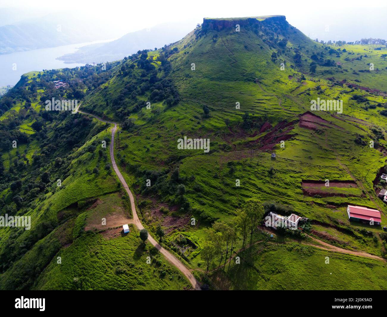 Aerial view of a forested area with fields and rural buildings Stock ...