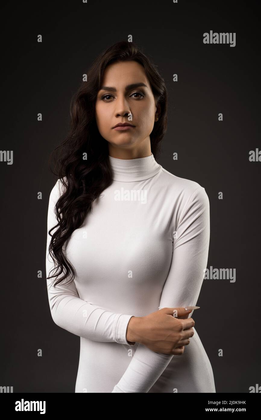 Emotionless woman in white hi-res stock photography and images - Alamy