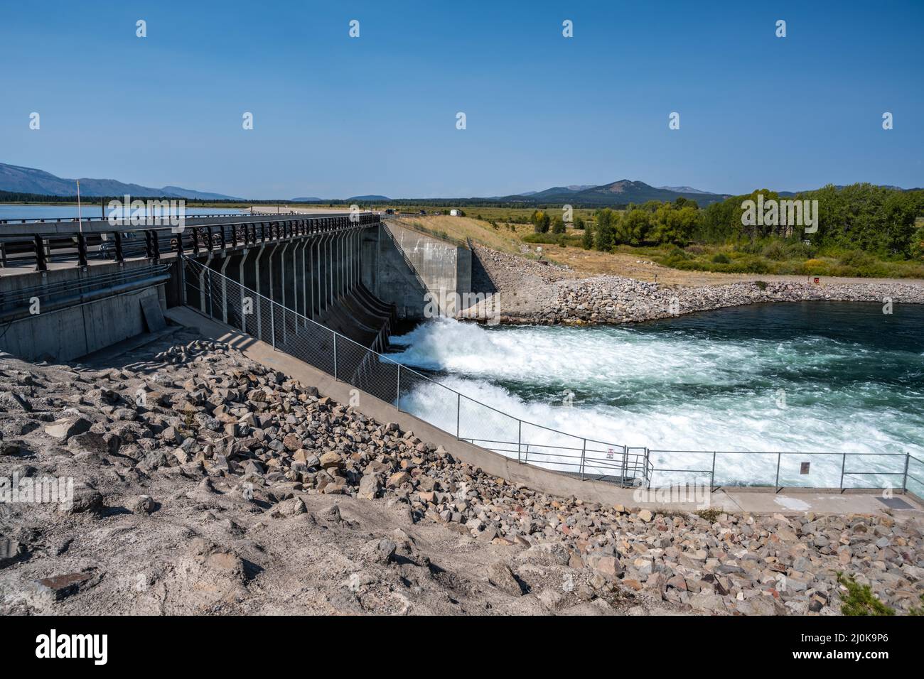 A concrete and earth-fill dam in Grand Teton NP, Wyoming Stock Photo ...