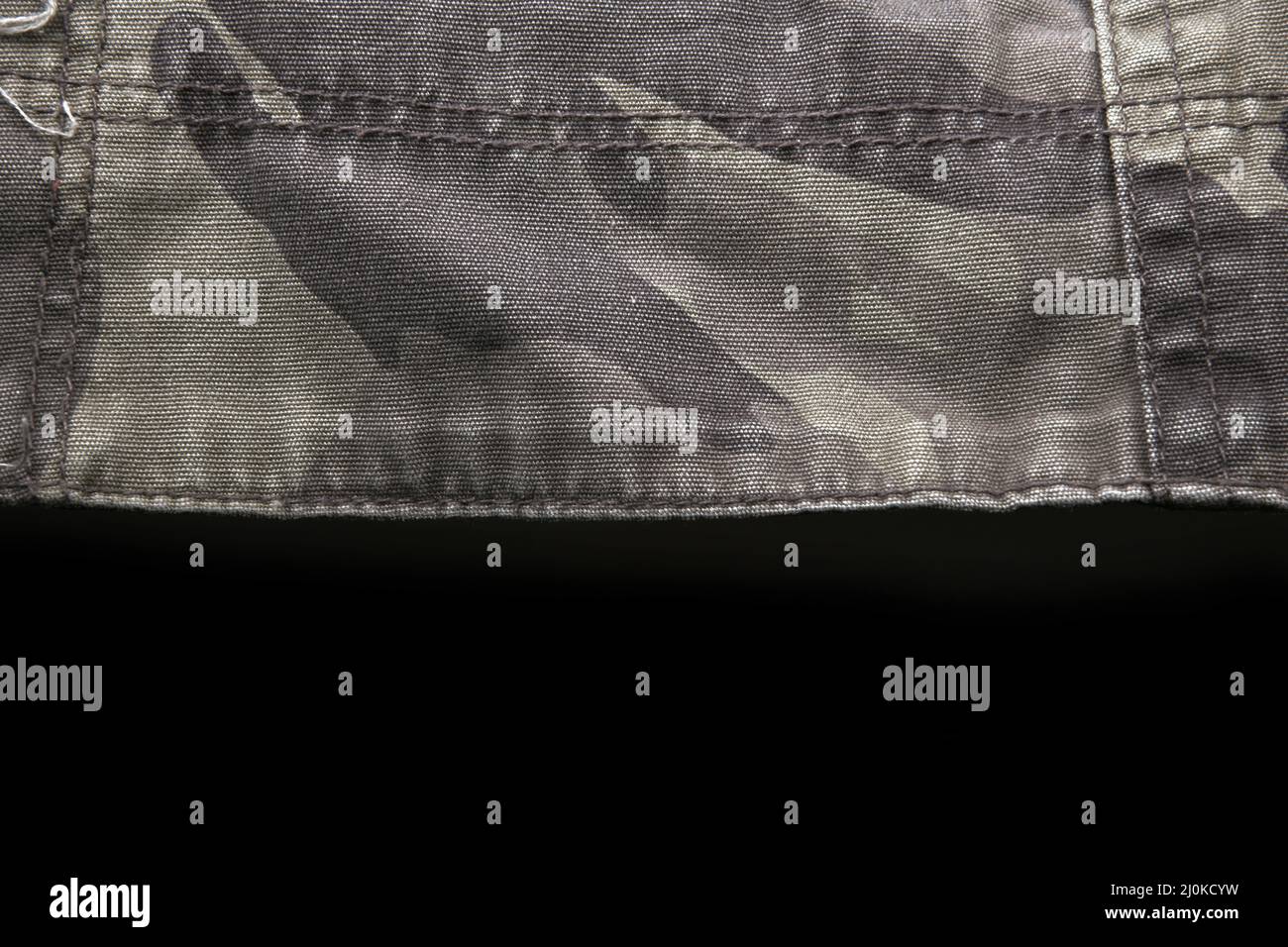 close up of the camouflage textured fabric border background Stock ...