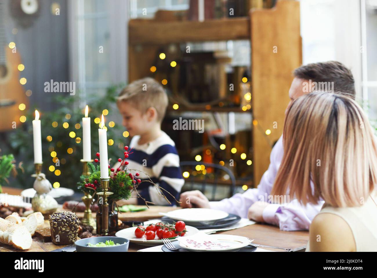 Woman table during family dinner hi-res stock photography and images ...