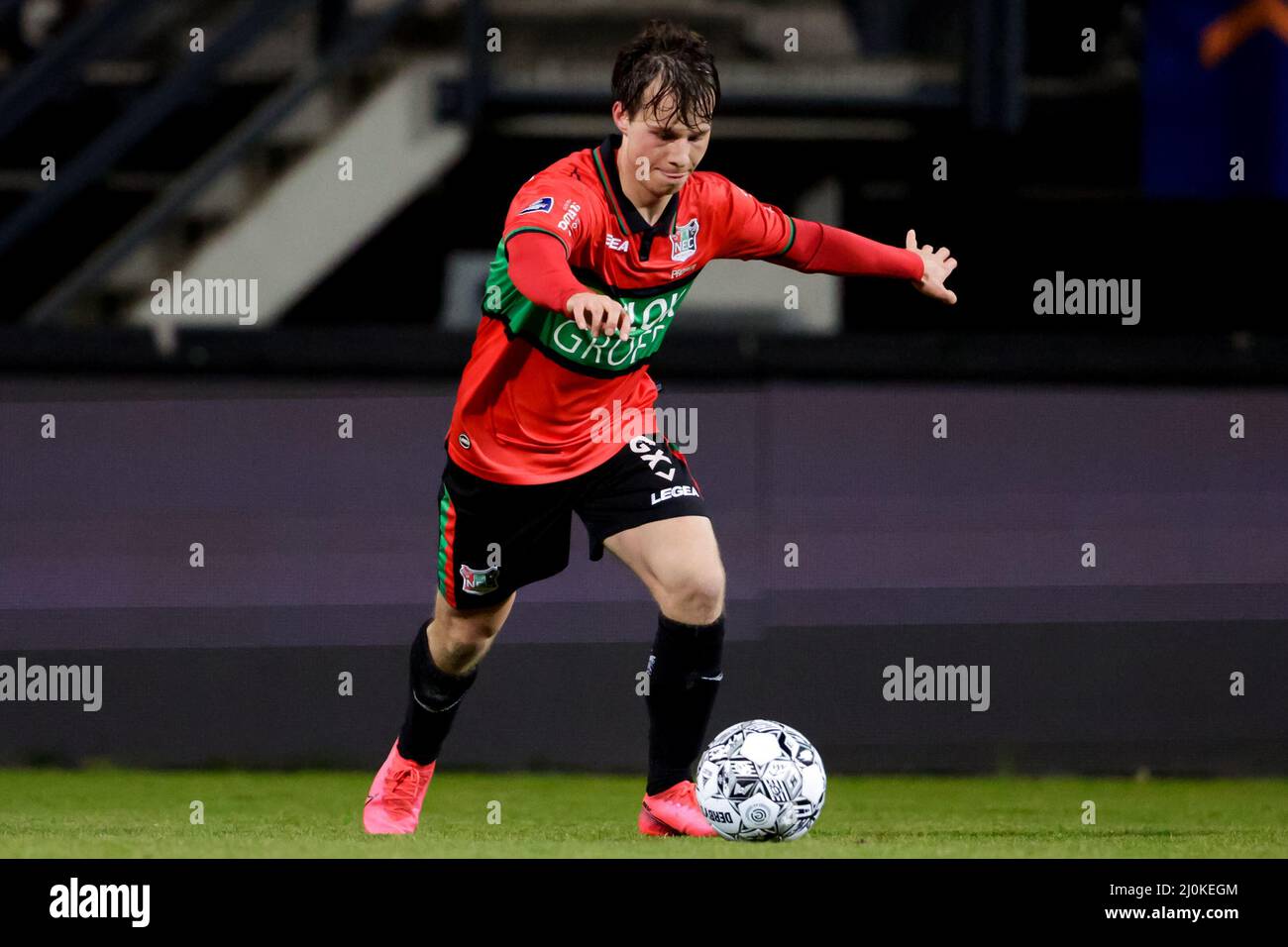 NIJMEGEN, NETHERLANDS - MARCH 19: Dirk Proper of N.E.C. dribbles with ...