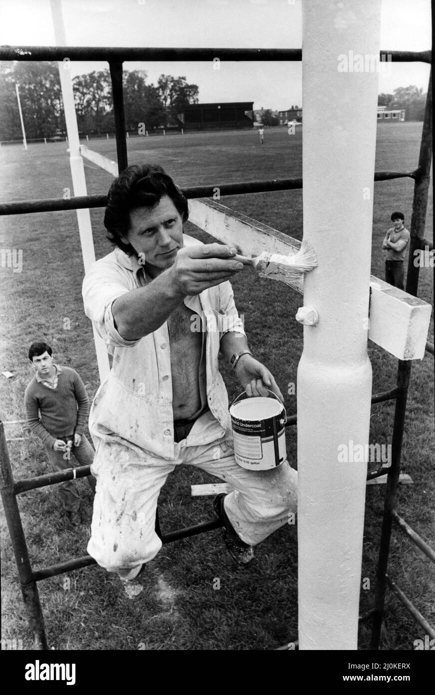 Workmen painting the 30ft. rugby posts at the Northern Rugby Team ...