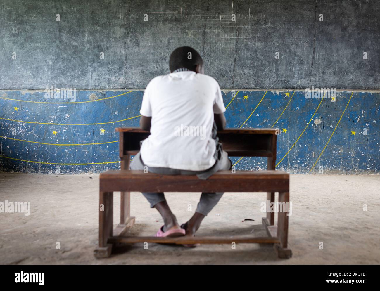 Poor kid studying hi-res stock photography and images - Alamy