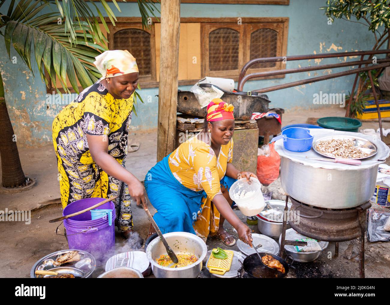 African woman cooking traditional food hi-res stock photography and ...
