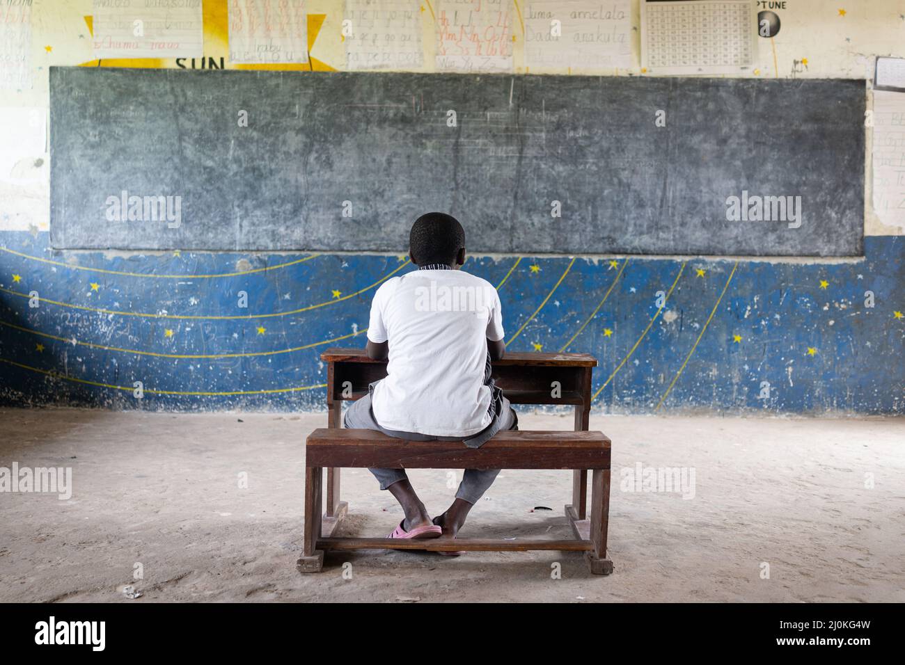 Poor kid studying hi-res stock photography and images - Alamy