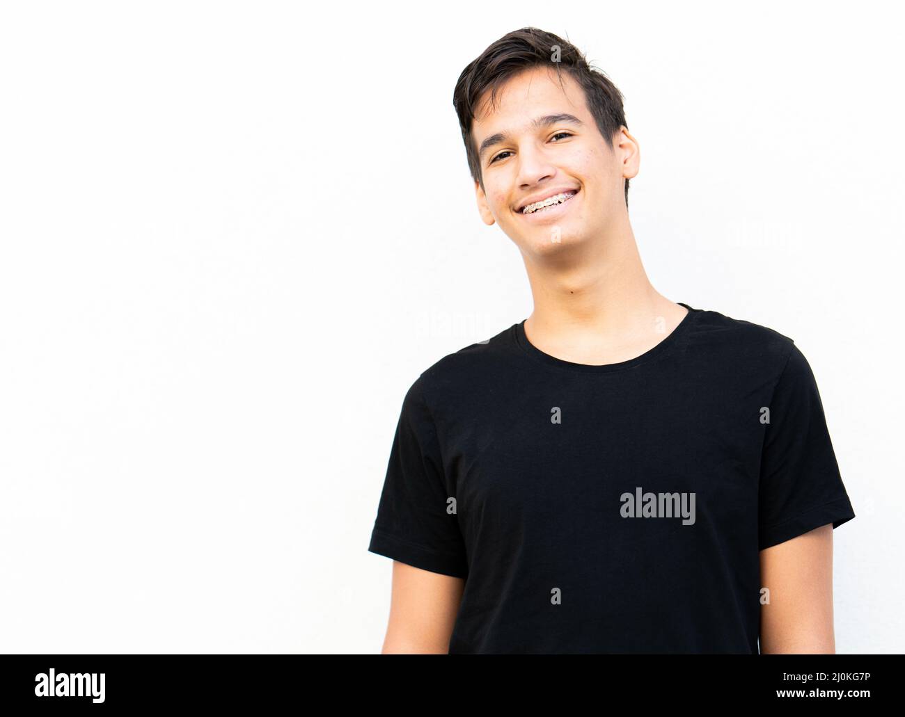 One positive teenage boy with acne and braces Stock Photo - Alamy