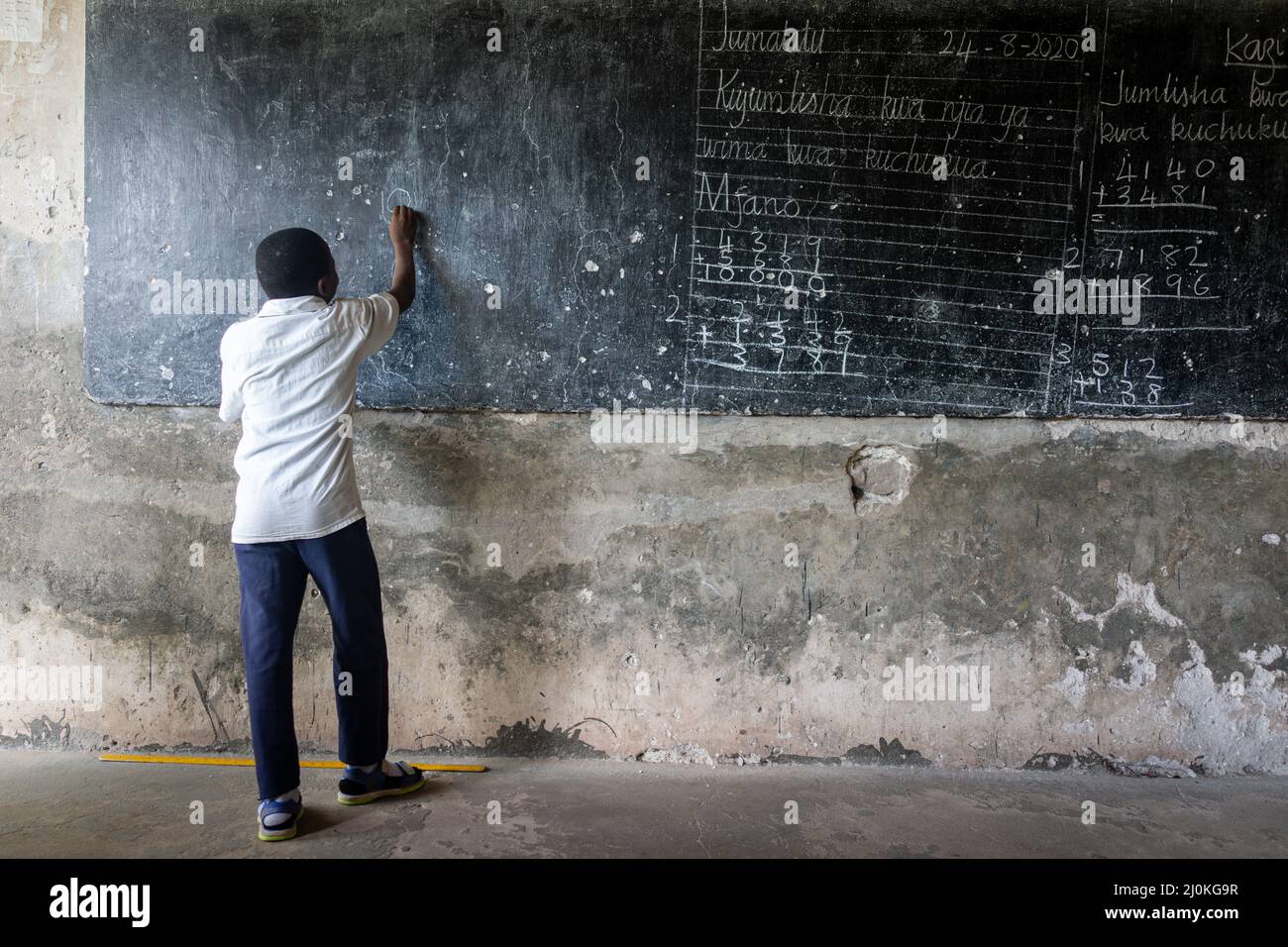 Poor boy rear view hi-res stock photography and images - Alamy
