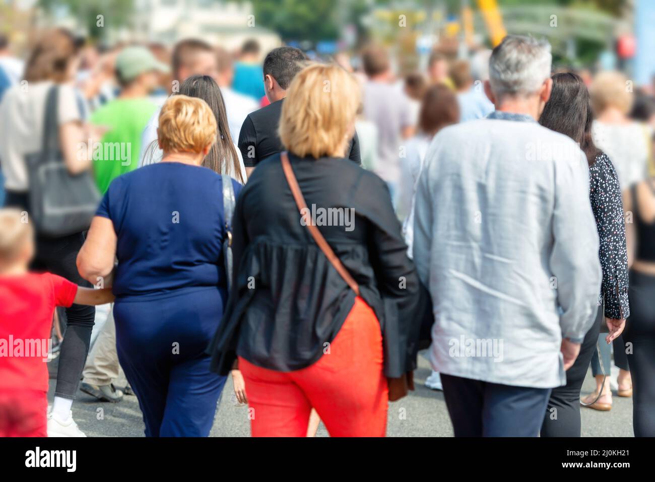 Woman on street crowd hi-res stock photography and images - Alamy