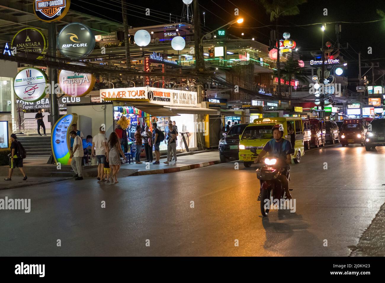 Thawewong Road in Patong by night. This road along Patong beach is very ...