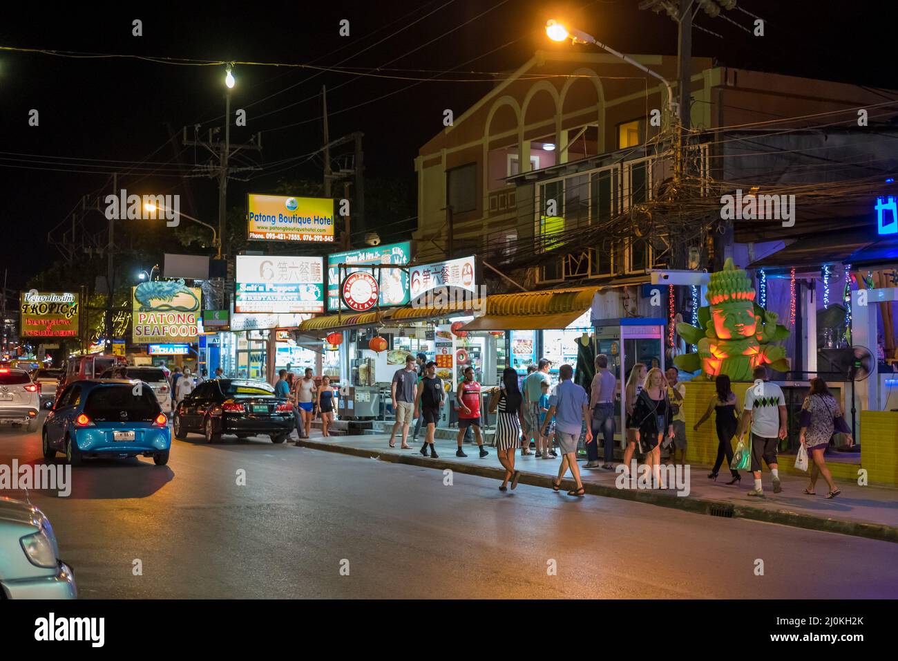 Thawewong Road in Patong by night. This road along Patong beach is very ...