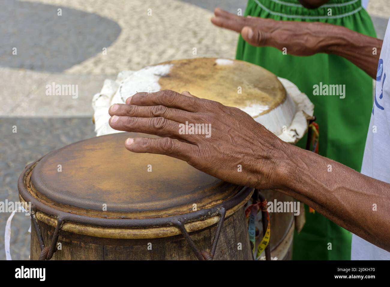 Afro-brazilian cultural manifestation with man hands playing atabaque ...