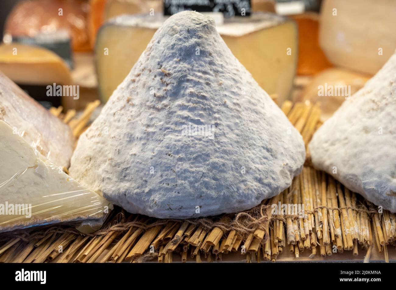 French cheese cone shaped port aubry on farmer market Stock Photo - Alamy