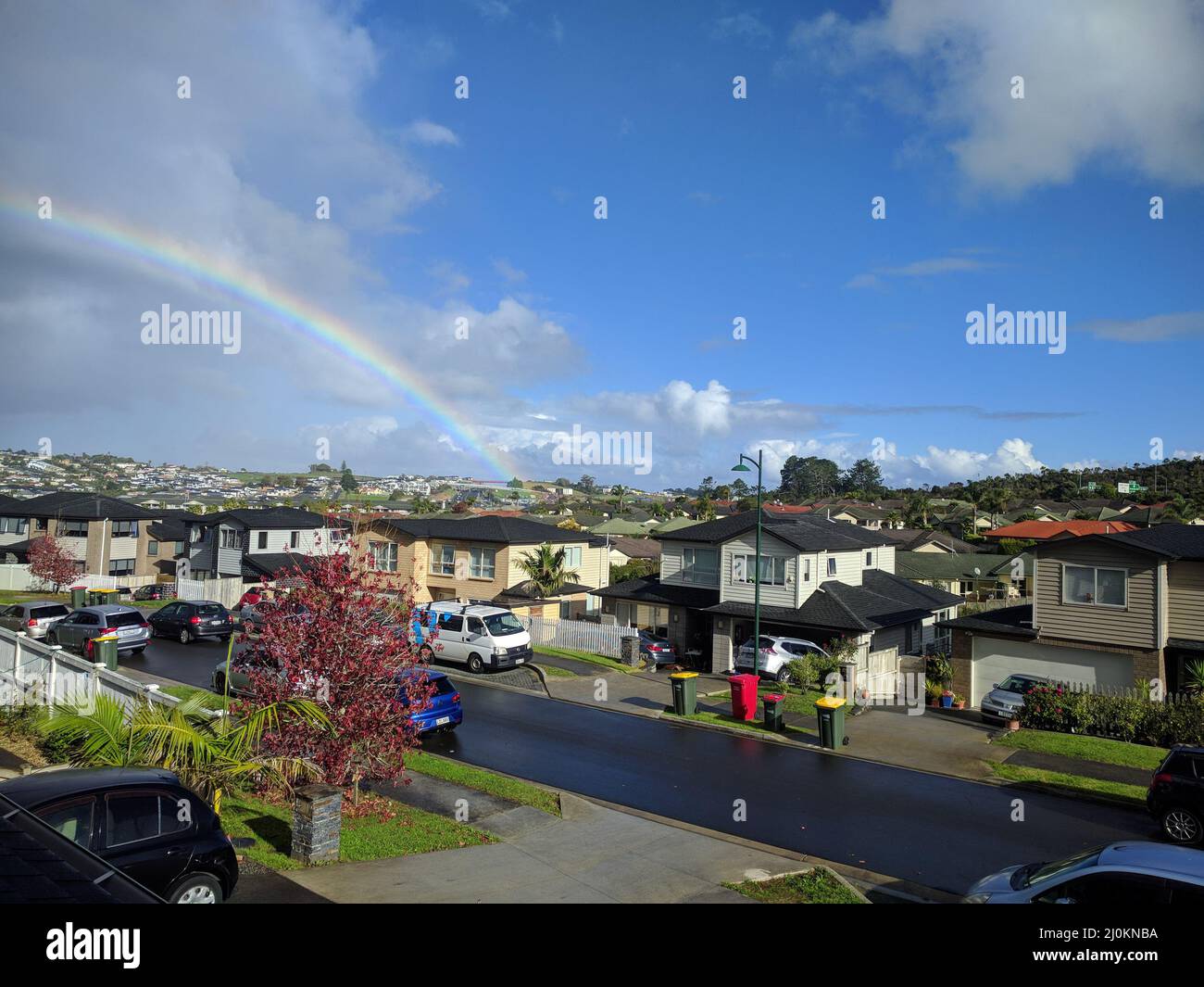 Auckland suburb, New Zealand - May 4 2020: the view of rainbow over ...