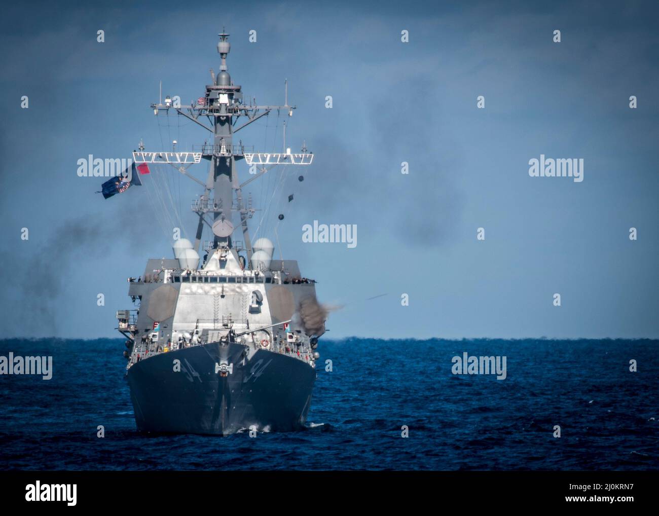 The guided missile destroyer USS Nitze (DDG 94) fires its MK-45 5 inch ...