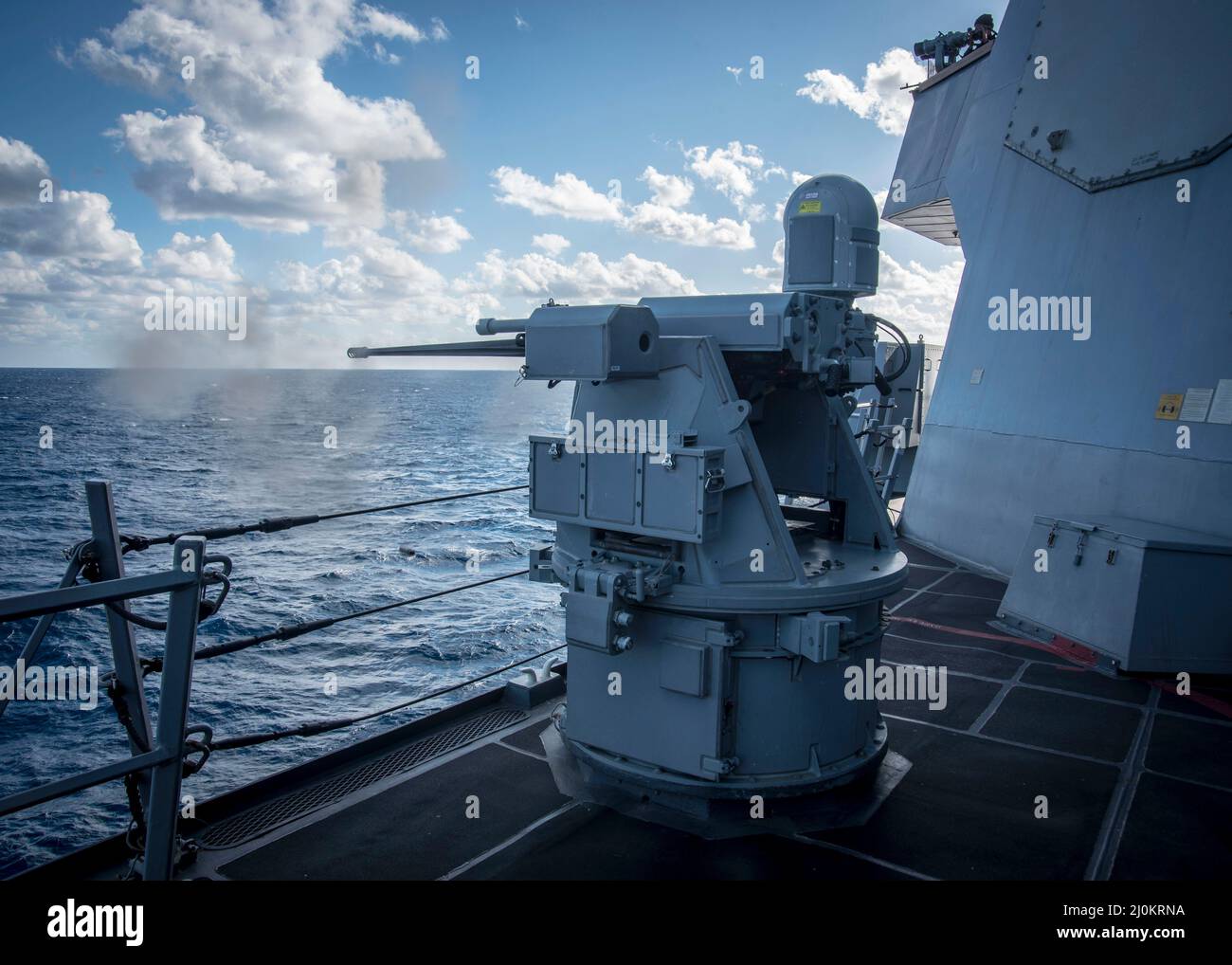 The guided missile destroyer USS Delbert D. Black (DDG 119) fires a MK ...