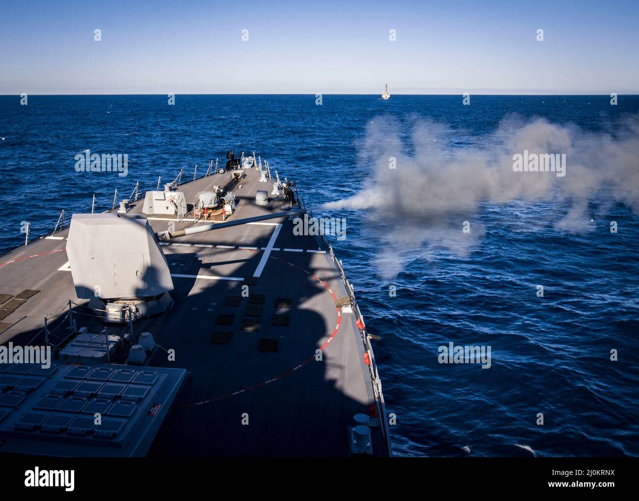 The guided missile destroyer USS Delbert D. Black (DDG 119) fires its ...