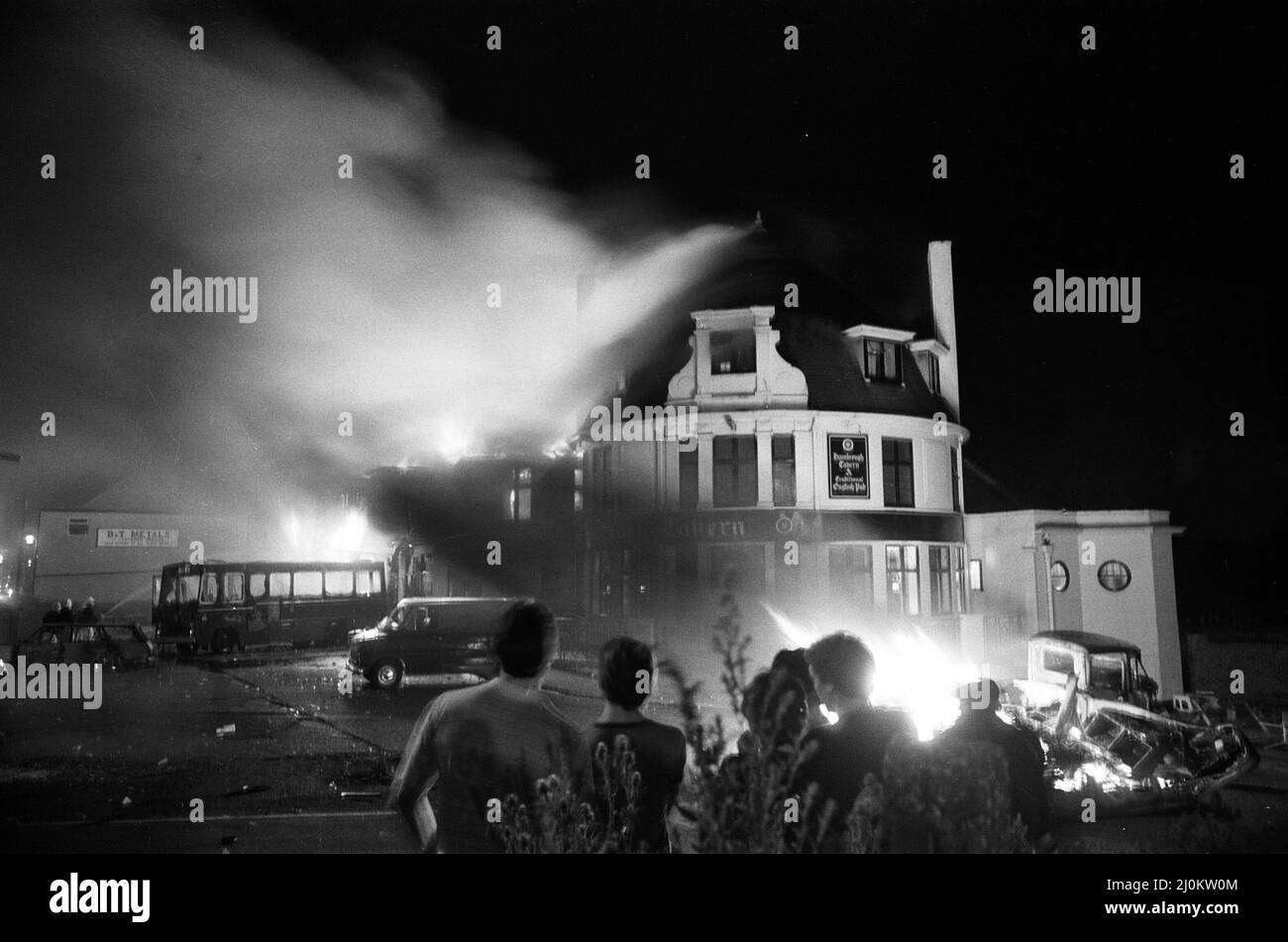 Southall Riots General scene pictures with people, policemen, fire, and ...