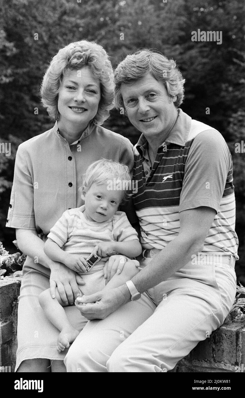 Michael Aspel pictured at home with his wife Lizzie Power and their son ...