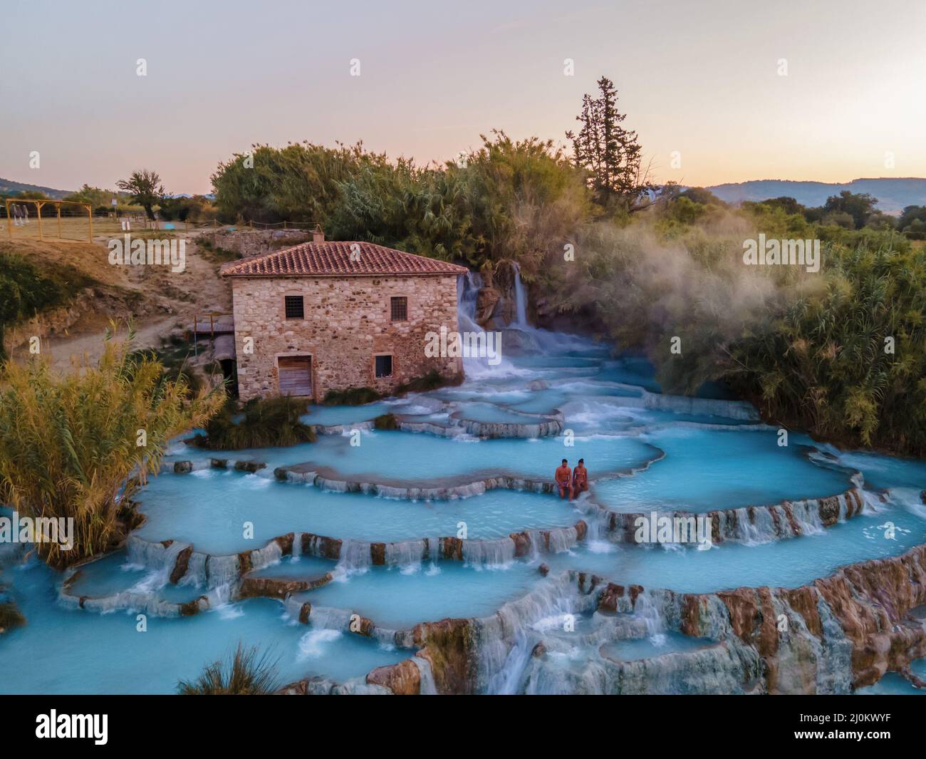 Natural spa with waterfalls and hot springs at Saturnia thermal baths ...