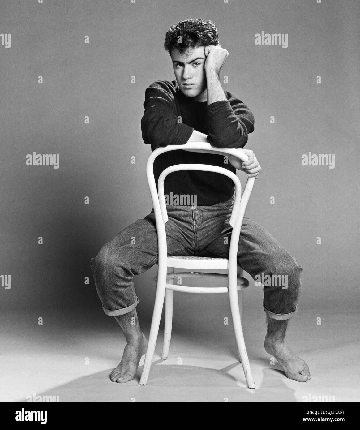 George Michael of the teenage pop duo Wham!, poses in the studio. 26th ...