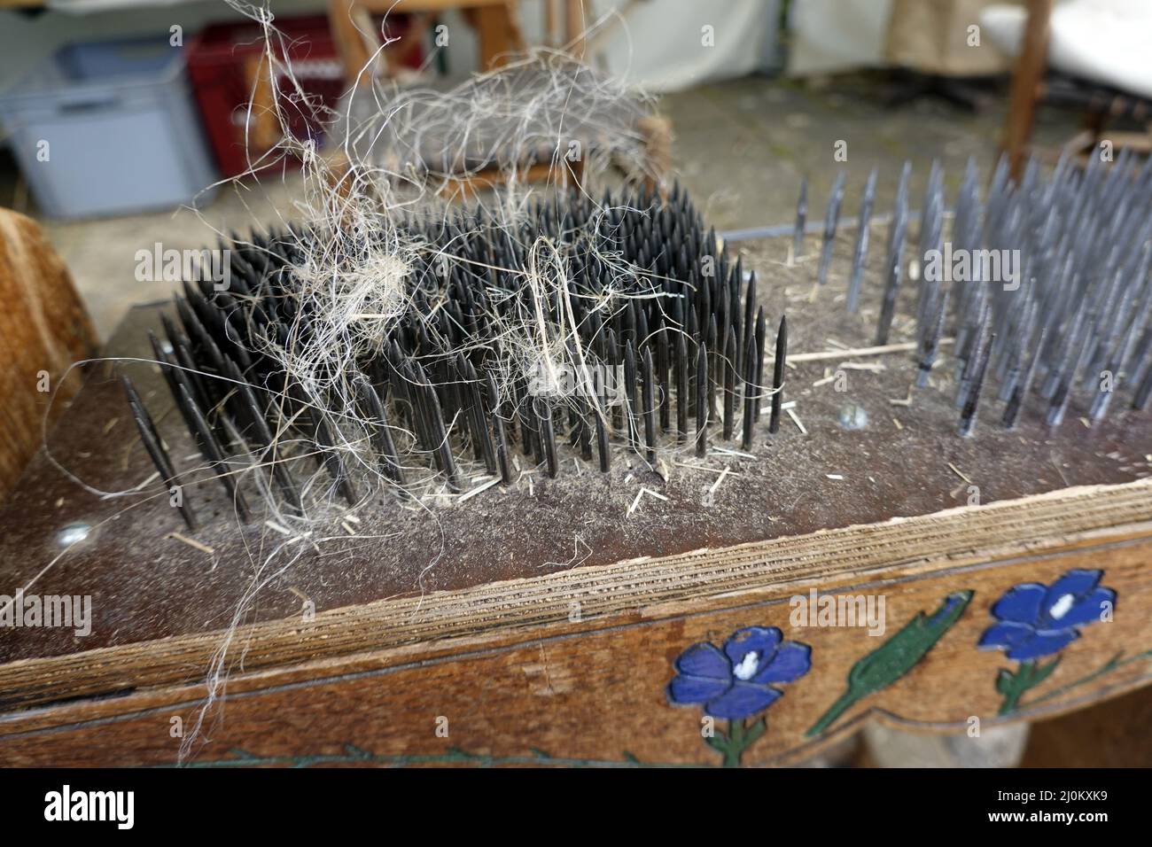 Old handicraft - tool for linen production at the handicraft market in ...
