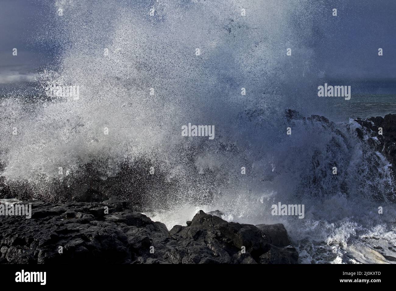 Roaring sea surf on the black lava coast, near Skardsvik, SnÃ¦fellsnes ...