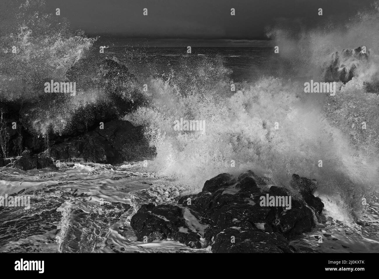 Roaring sea surf on the black lava coast, near Skardsvik, SnÃ¦fellsnes ...