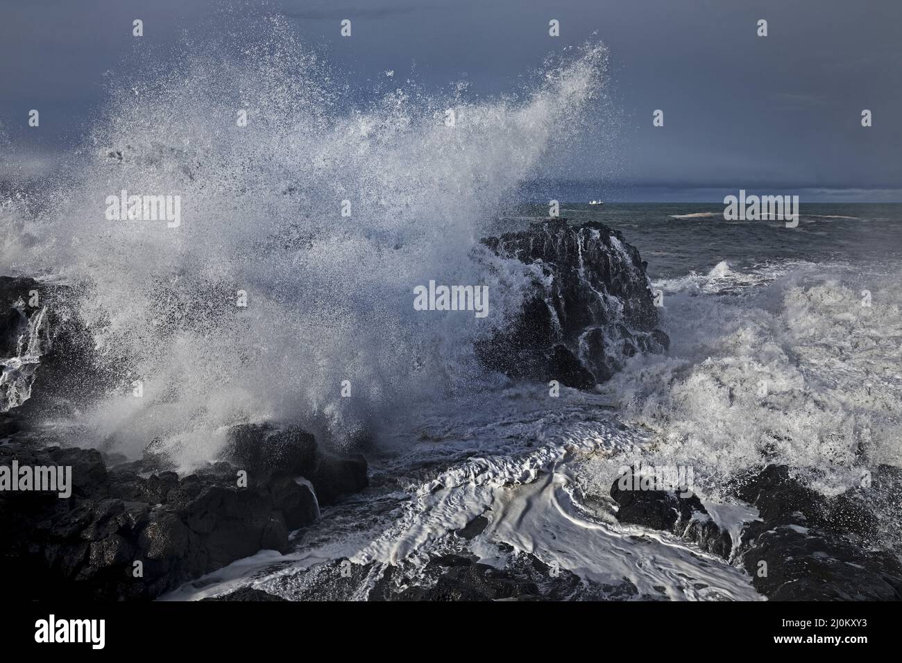 Roaring sea surf on the black lava coast, near Skardsvik, SnÃ¦fellsnes ...