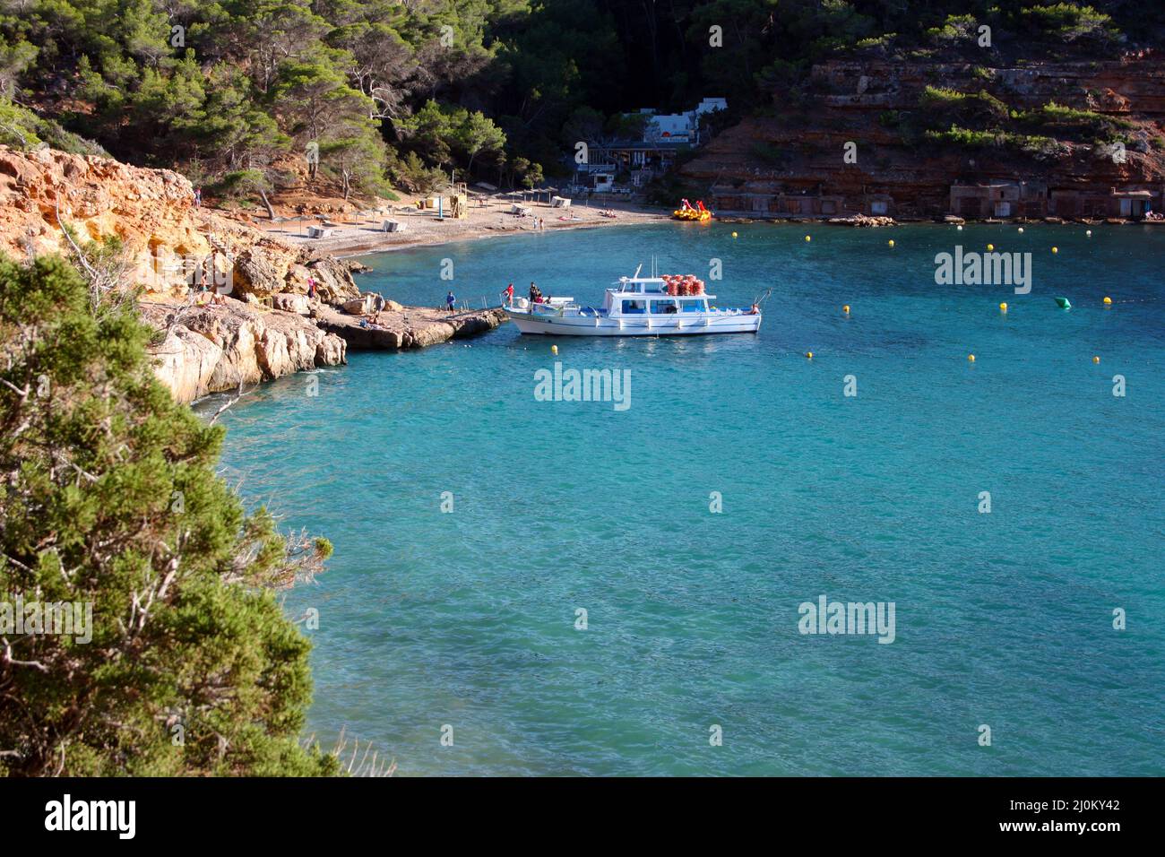 summer tourist coast of cala salada in ibiza in balearic island Stock ...