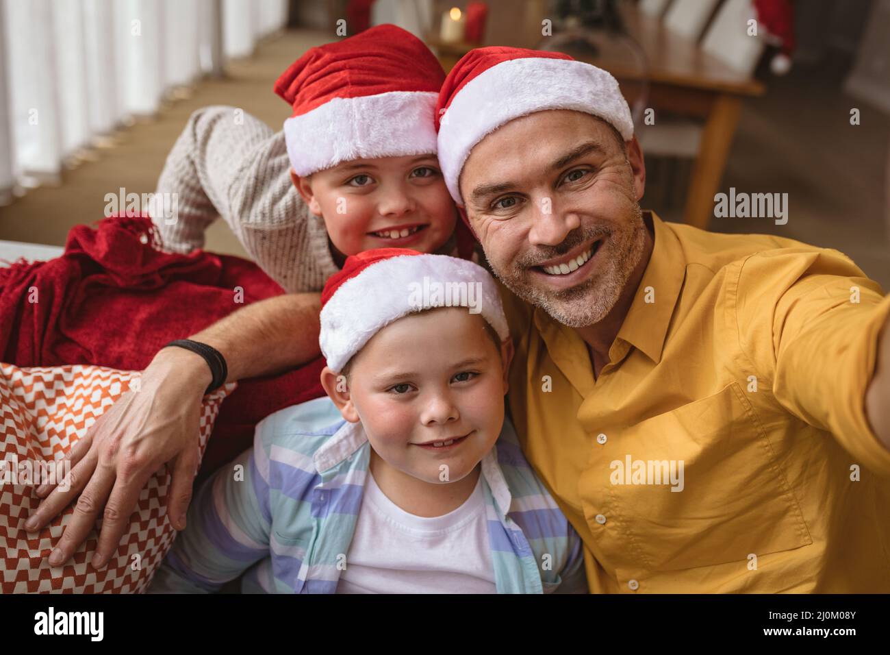 Father son during christmas hi-res stock photography and images - Alamy